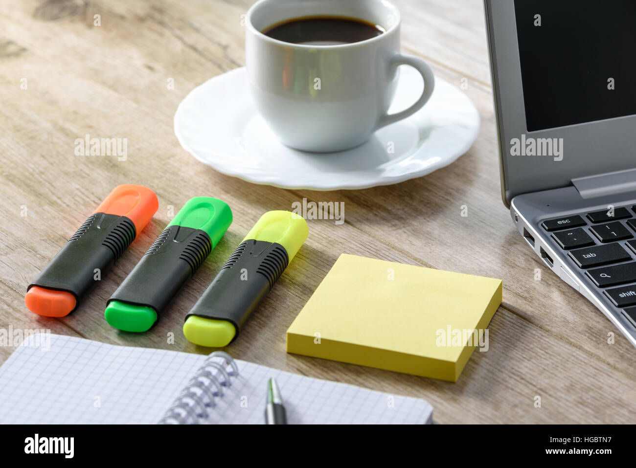 Different color of markers on a wooden vintage table and the yellow ...