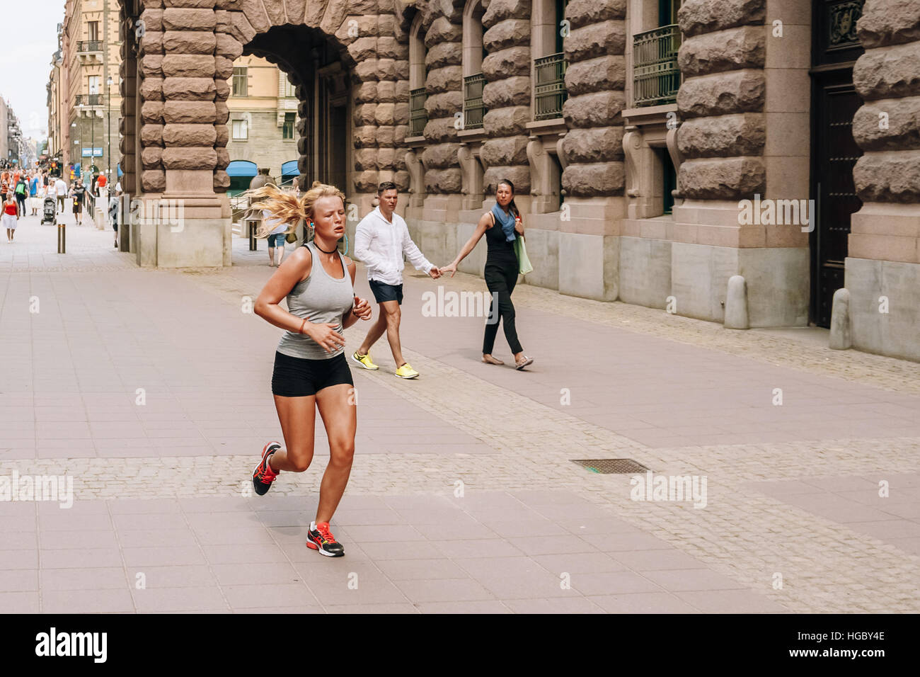 Stockholm, Sweden - July 30, 2014: Young Attractive Girl Running Near ...