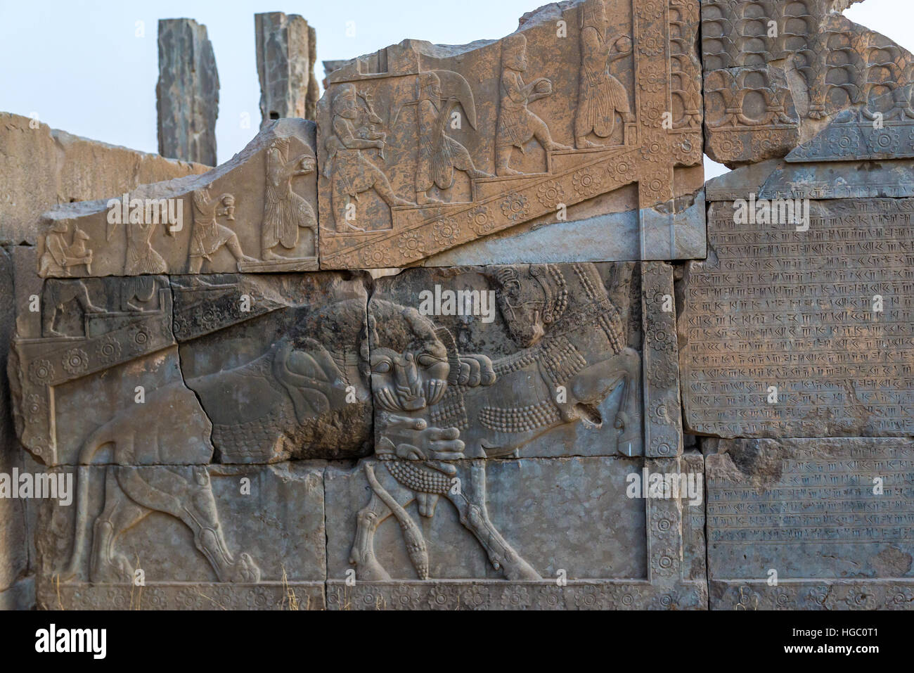 Relief of lion attacking bull on one of the palaces in ancient city ...