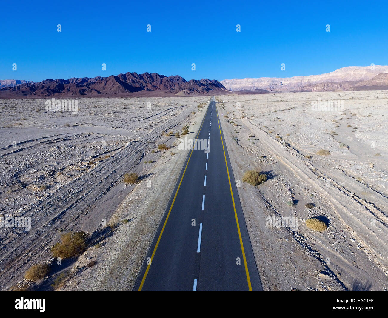 Empty desert road - Aerial image Stock Photo - Alamy