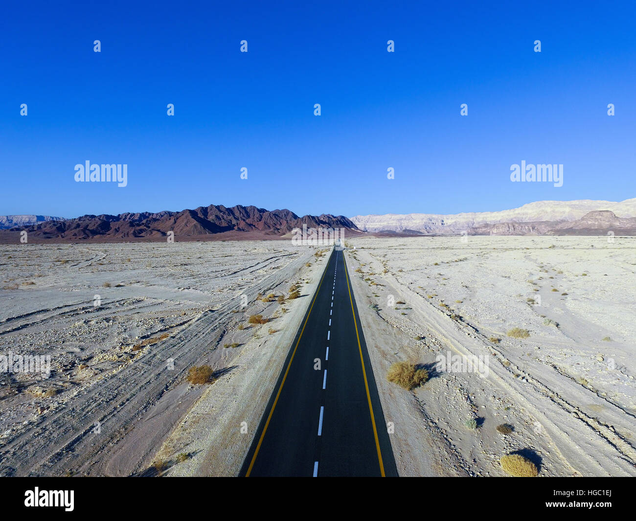 Empty desert road - Aerial image Stock Photo - Alamy