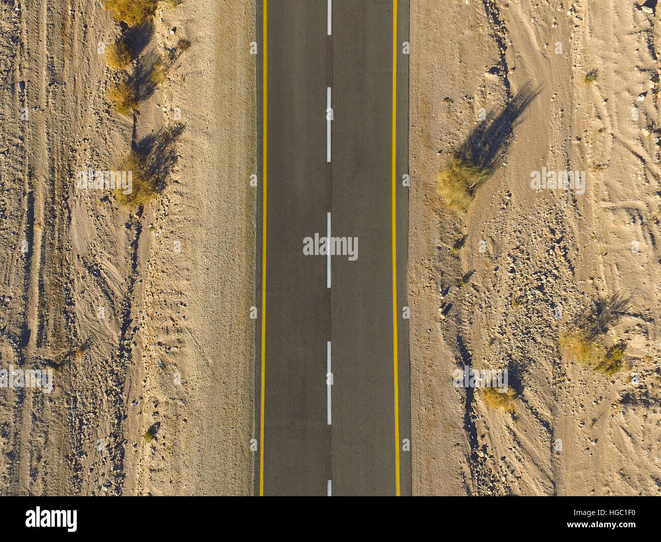 Empty desert road - Aerial image Stock Photo - Alamy
