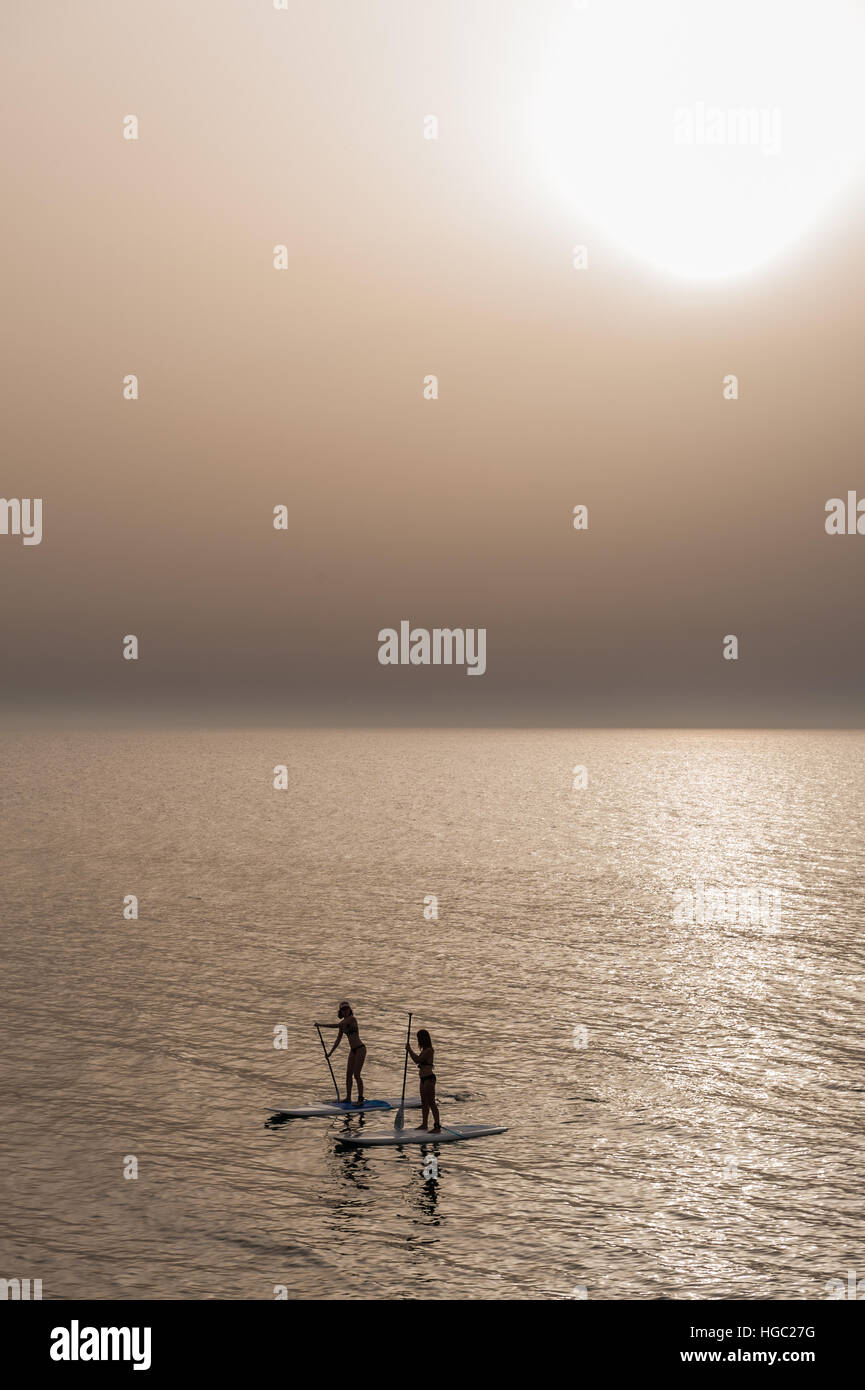 Women paddle boarding hi-res stock photography and images - Alamy