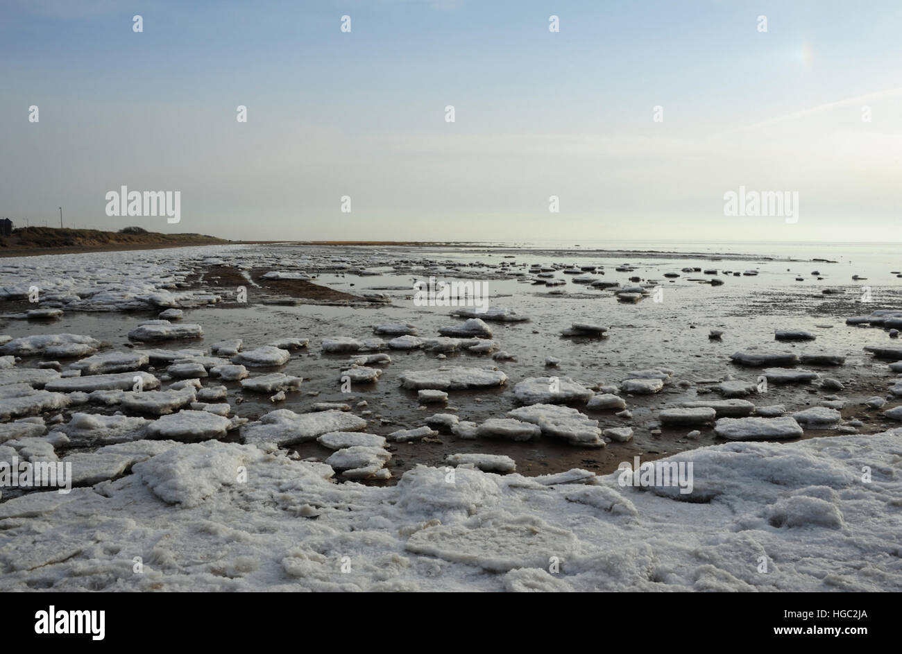 Land fast sea ice blocks lying beach sand saltmarsh hi-res stock ...
