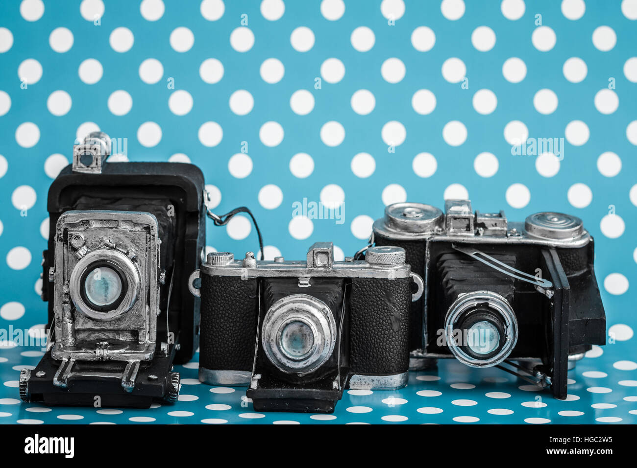 Decorative Old Antique Cameras on blue dotted background Stock Photo ...