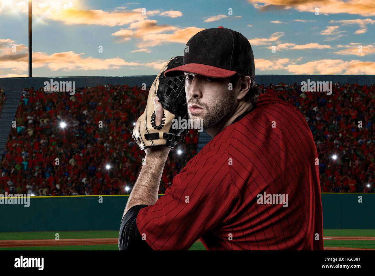 Pitcher Baseball Player with a red uniform on baseball Stadium Stock ...