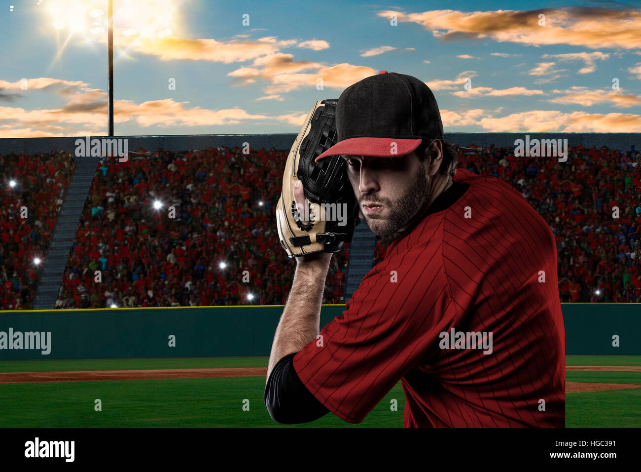 Pitcher Baseball Player with a red uniform on baseball Stadium Stock ...