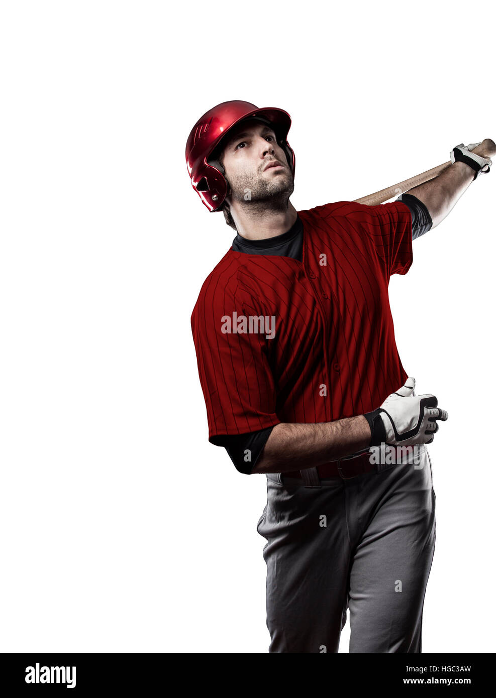 Baseball Player with a red uniform on white background Stock Photo - Alamy