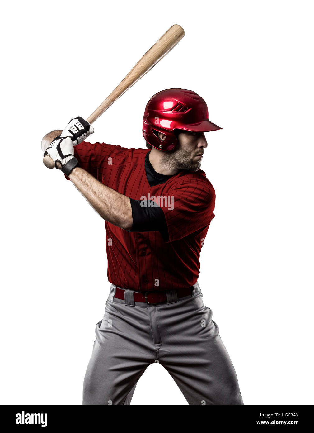 Baseball Player with a red uniform on white background Stock Photo - Alamy