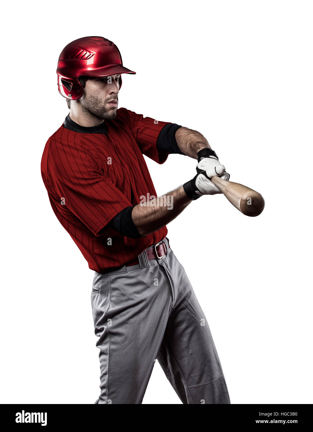 Baseball Player with a red uniform on white background Stock Photo - Alamy