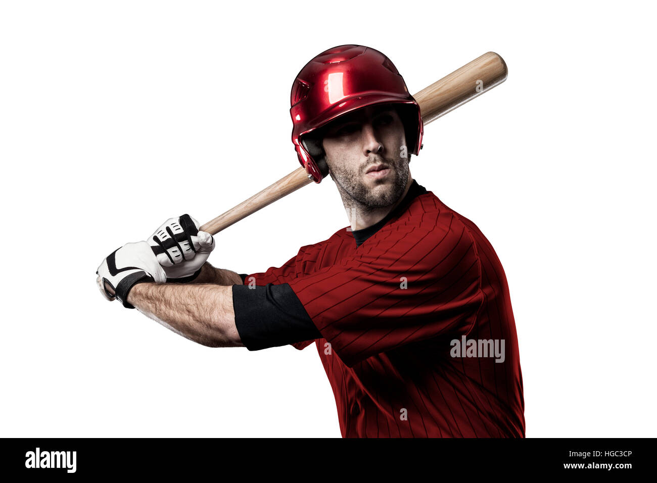 Baseball Player with a red uniform on white background Stock Photo - Alamy