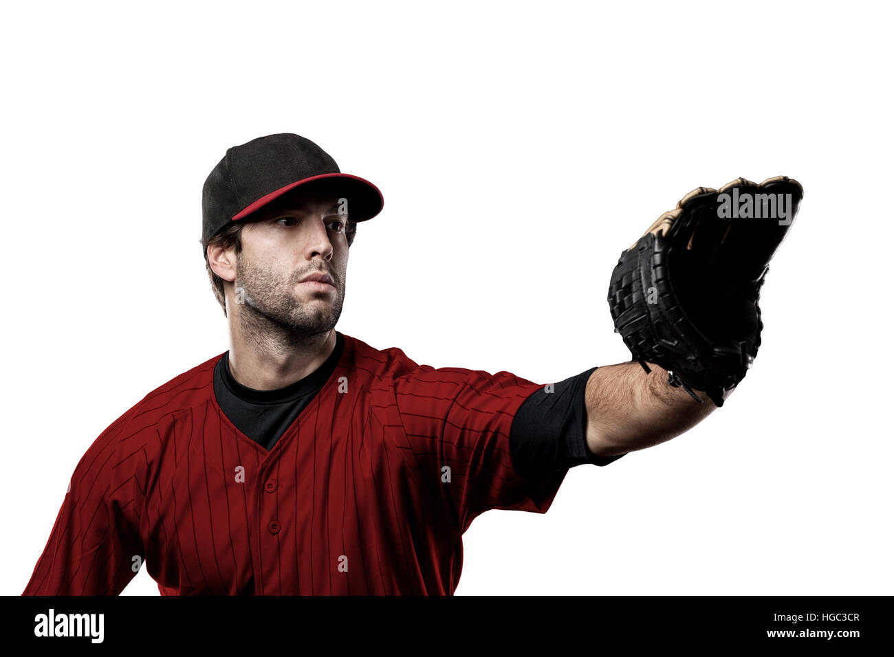 Baseball Player with a red uniform on white background Stock Photo - Alamy
