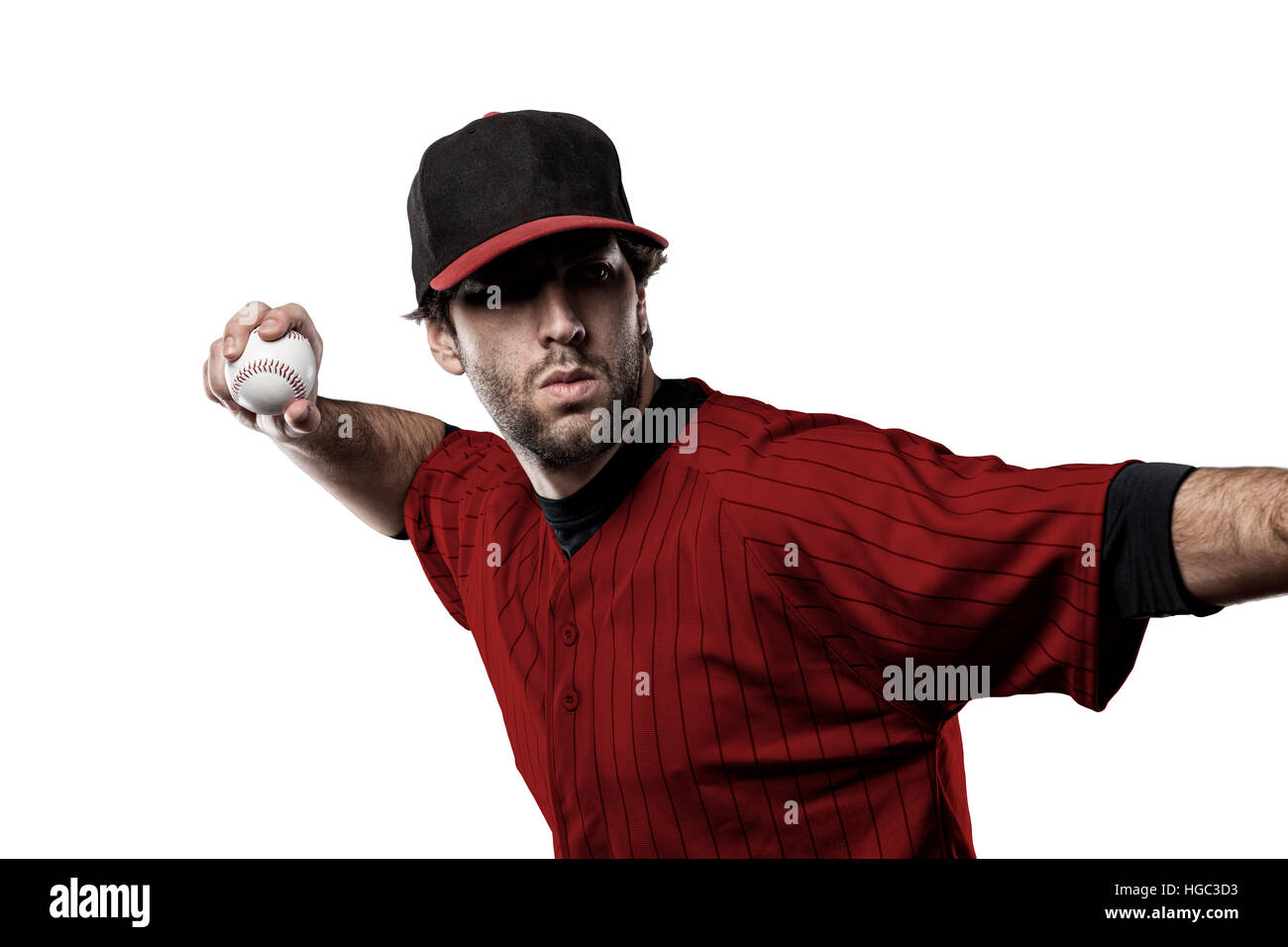Baseball Player with a red uniform on white background Stock Photo - Alamy