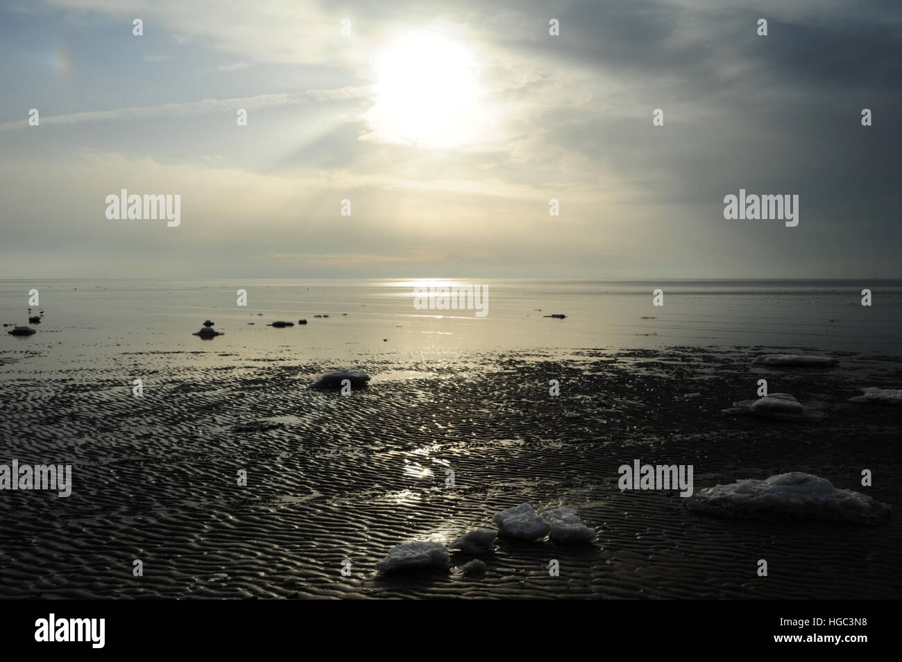 Isolated white land fast sea ice blocks lying beach sand hi-res stock ...
