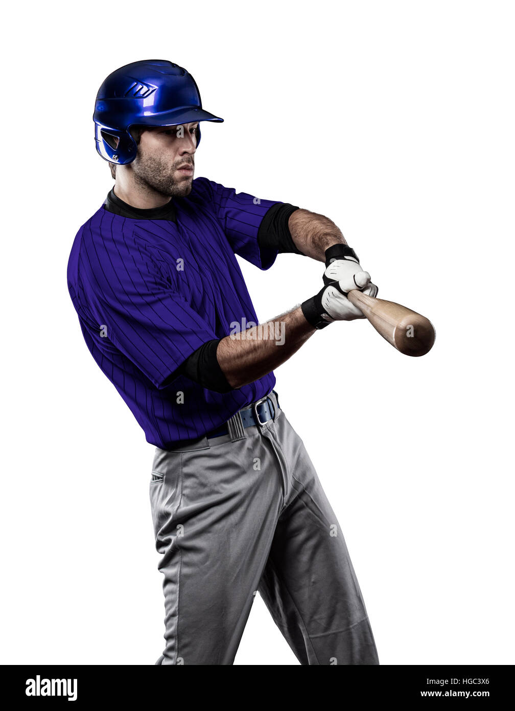 Baseball Player with a blue uniform on a white background Stock Photo ...