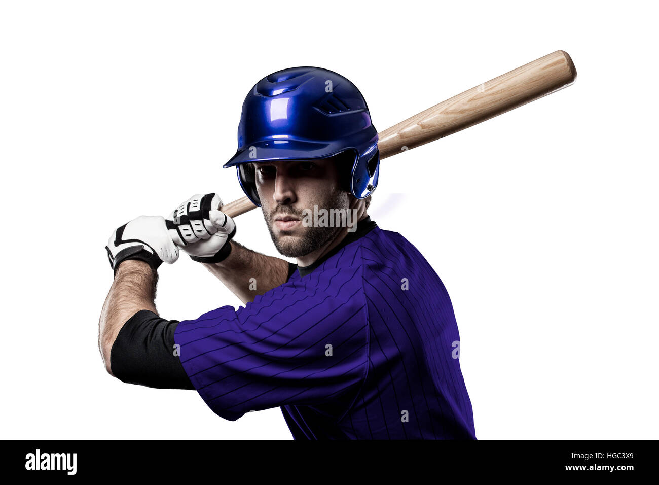 Baseball Player with a blue uniform on a white background Stock Photo ...