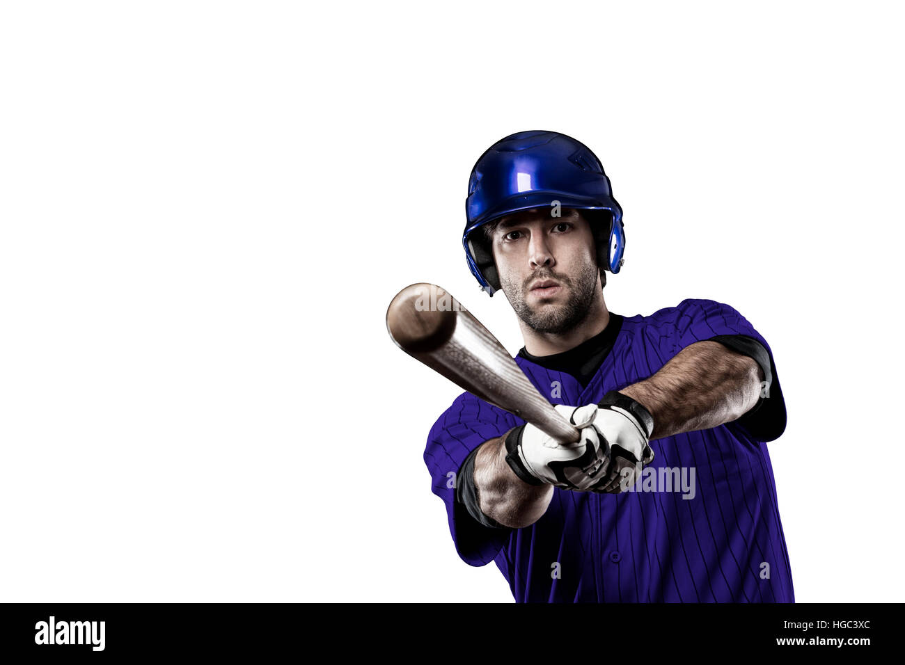 Baseball Player with a blue uniform on a white background Stock Photo ...