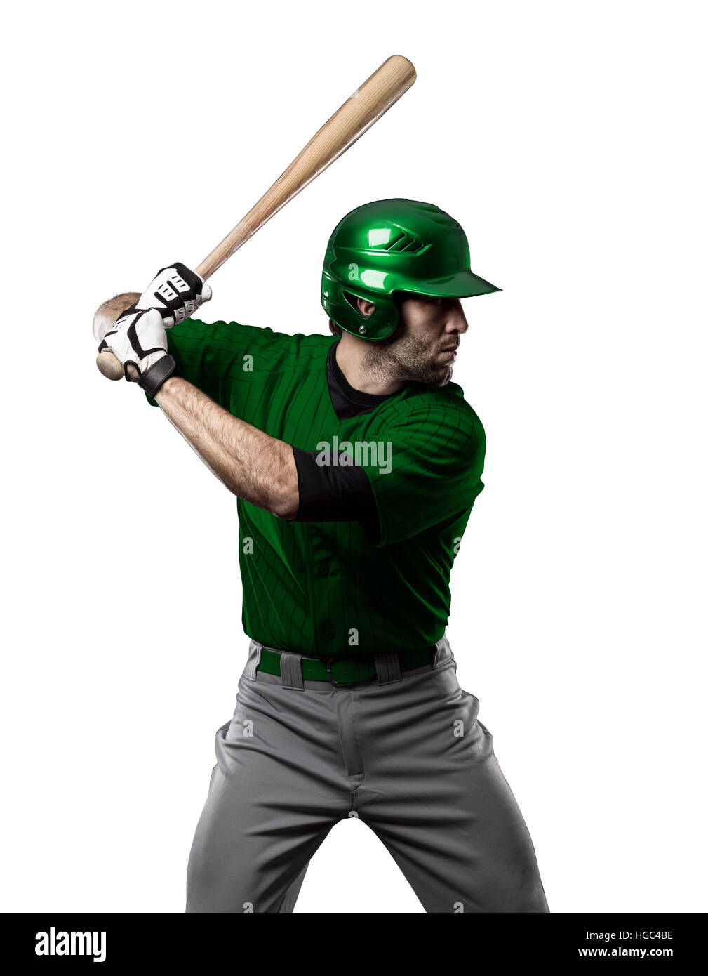 Baseball Player with a Green uniform on a white background Stock Photo ...