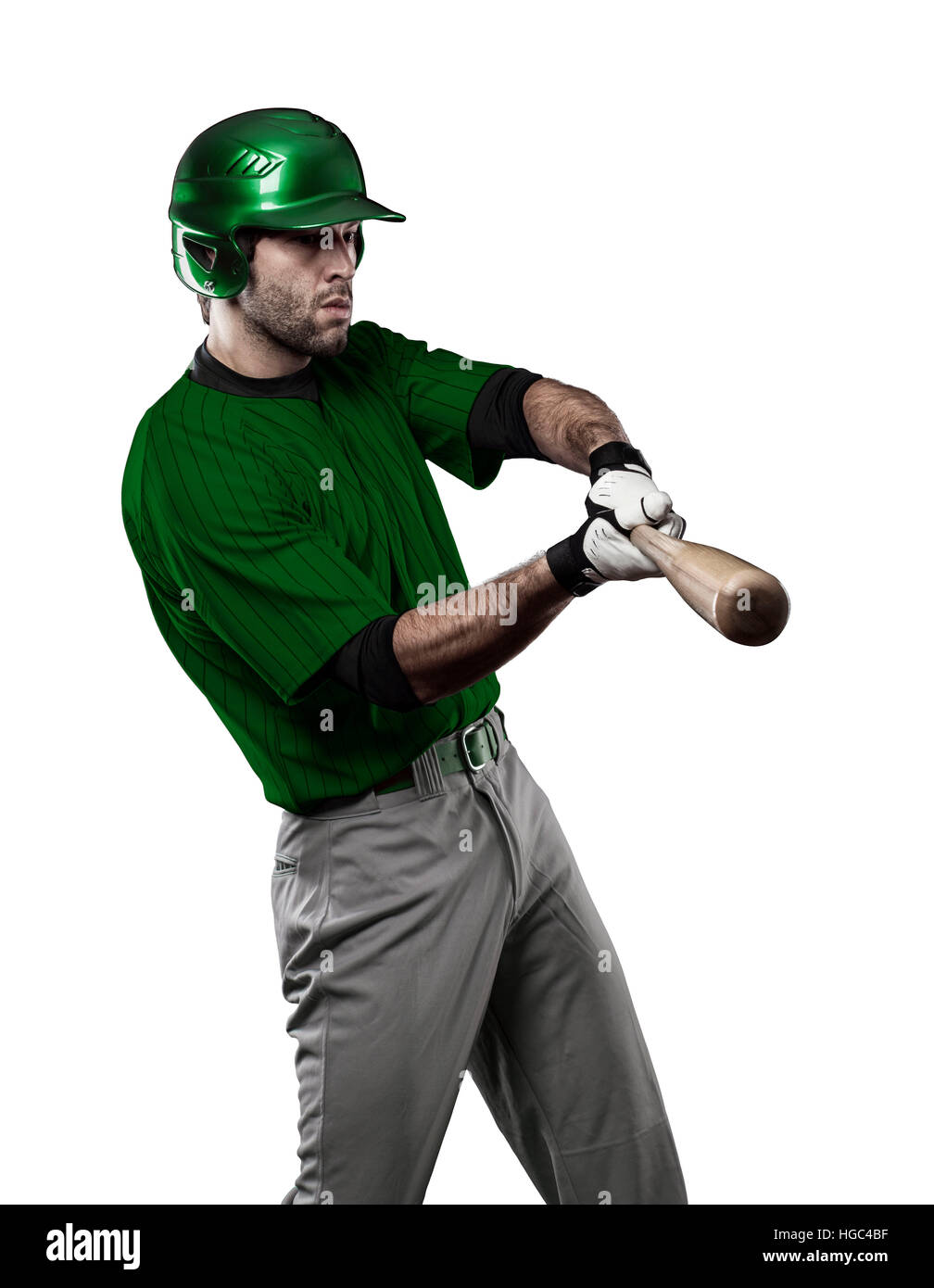 Baseball Player with a Green uniform on a white background Stock Photo ...