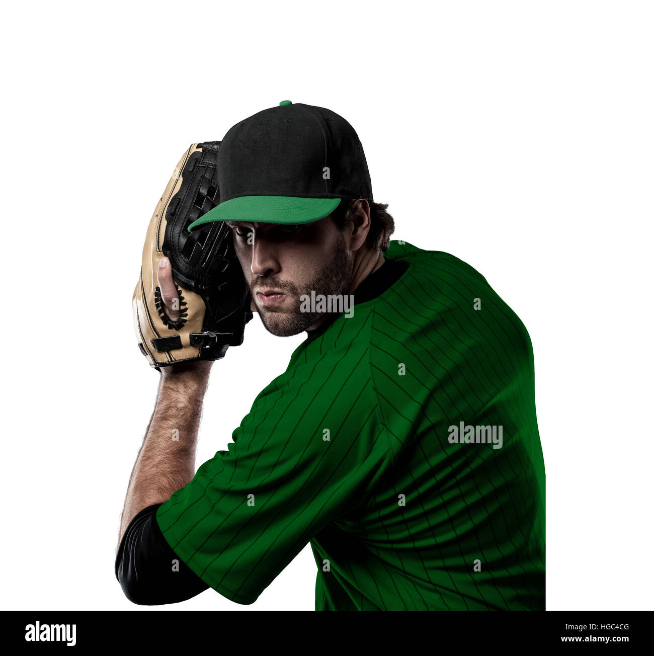 Pitcher Baseball Player with a green uniform on a white background ...