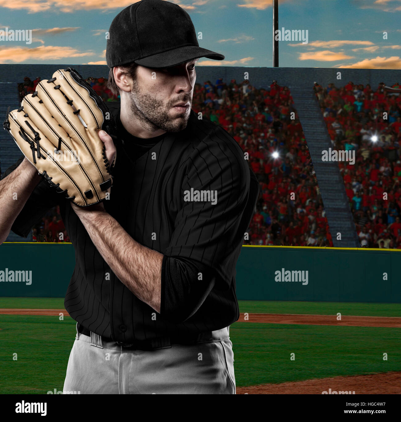 Pitcher Baseball Player with a black uniform on baseball Stadium Stock ...