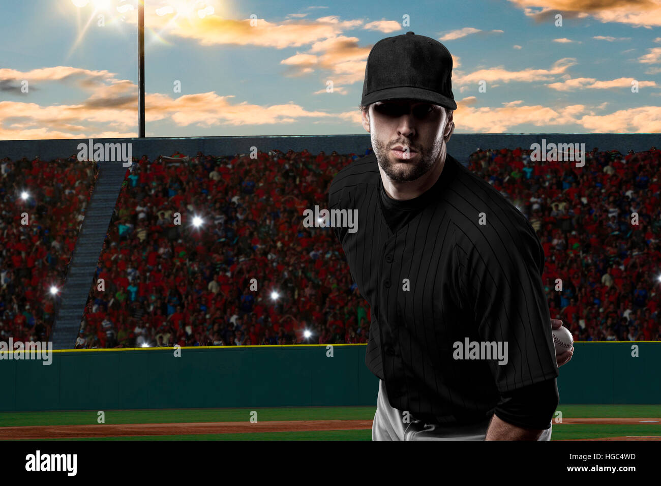 Pitcher Baseball Player with a black uniform on baseball Stadium Stock ...