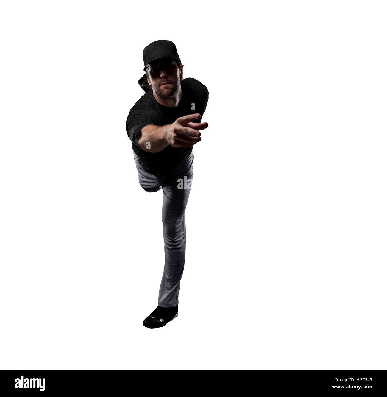 Pitcher Baseball Player with a black uniform on a white background ...