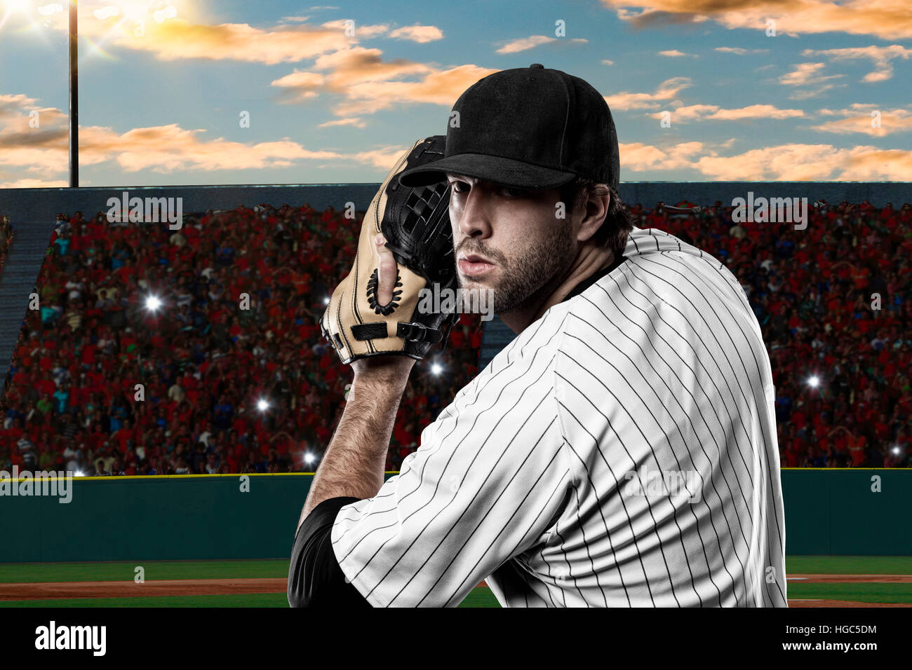 Pitcher Baseball Player with a white uniform on baseball Stadium Stock ...