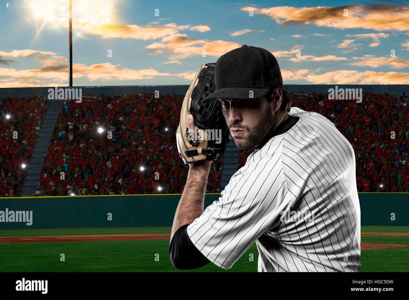 Pitcher Baseball Player with a white uniform on baseball Stadium Stock ...