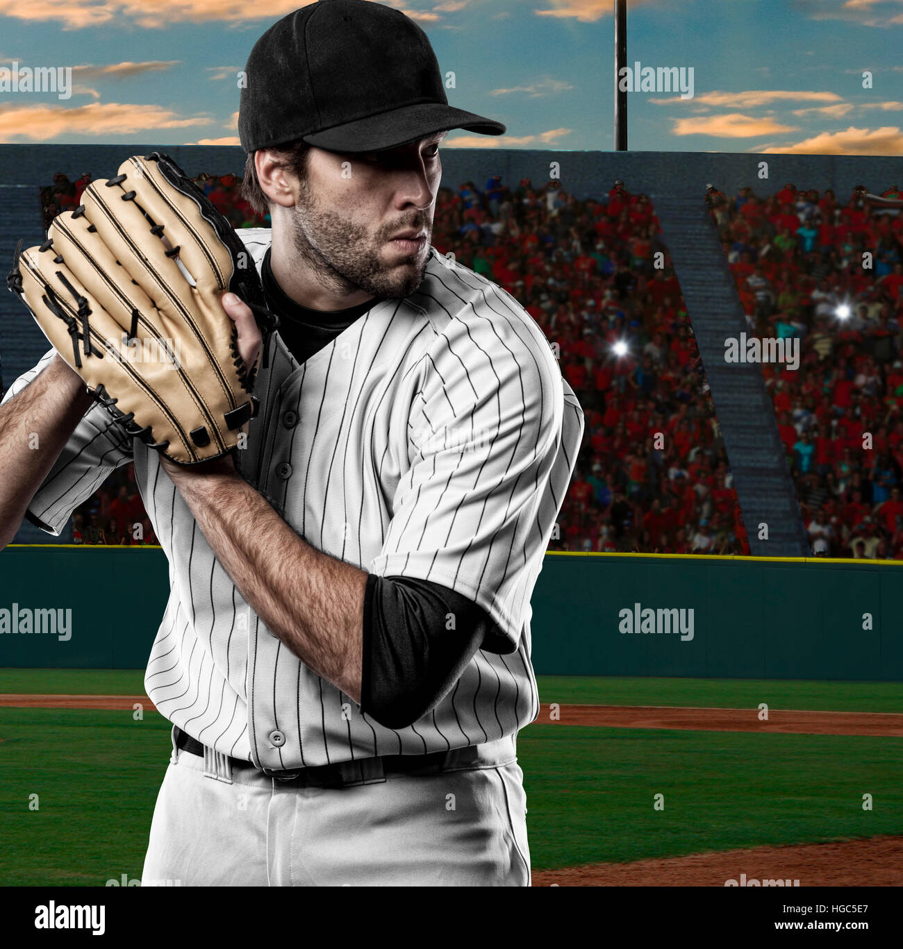 Pitcher Baseball Player with a white uniform on baseball Stadium Stock ...