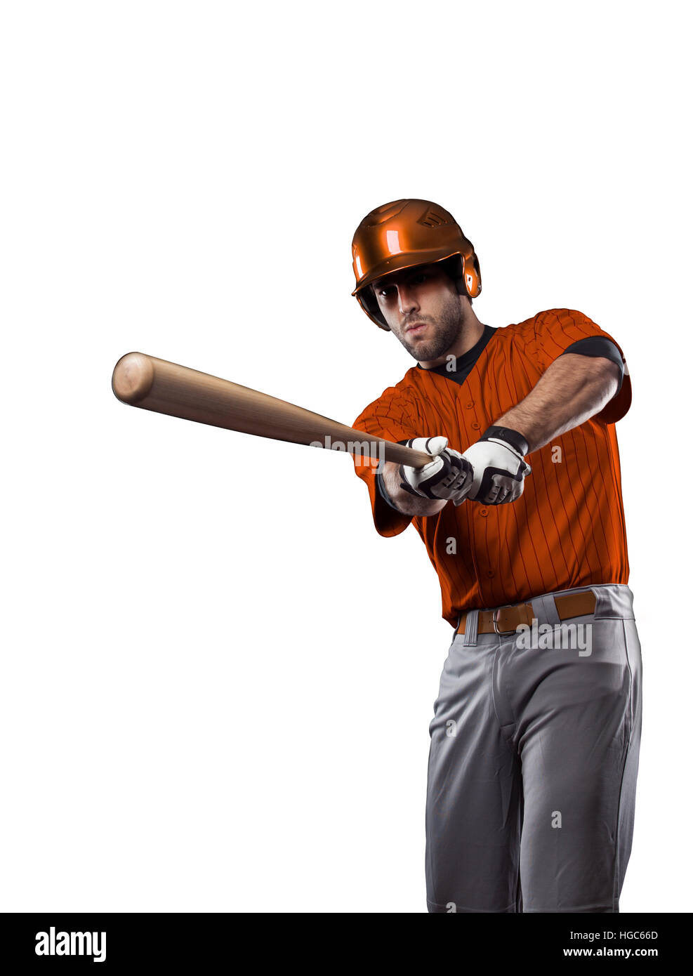 Baseball Player with a orange uniform on a white background Stock Photo ...