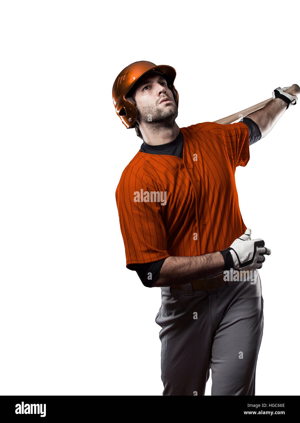 Baseball Player with a orange uniform on a white background Stock Photo ...