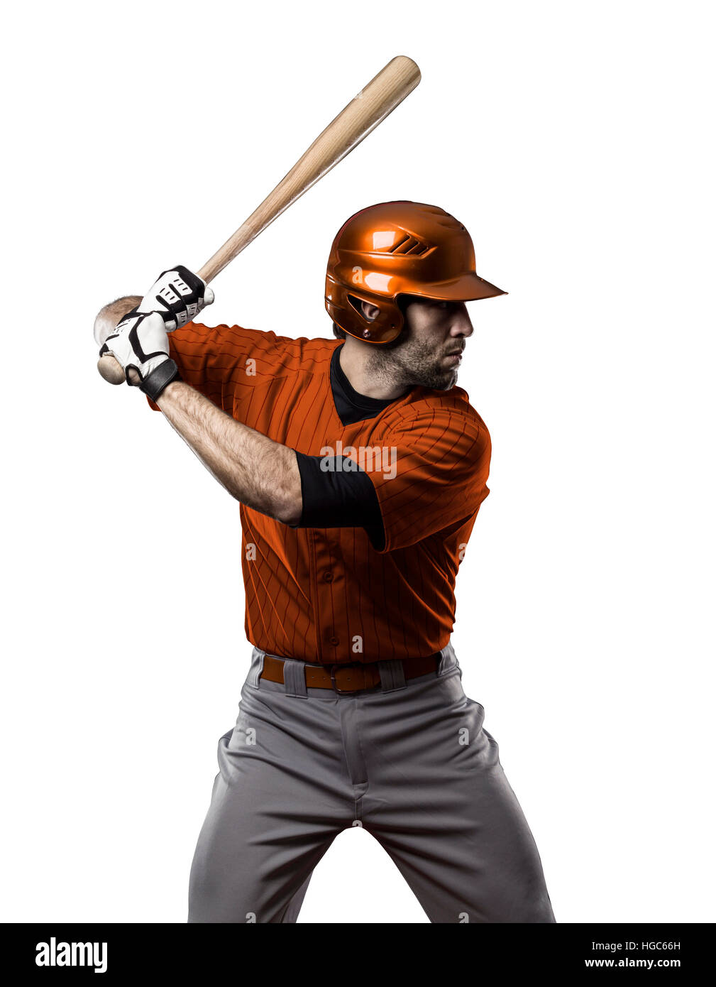 Baseball Player with a orange uniform on a white background Stock Photo ...