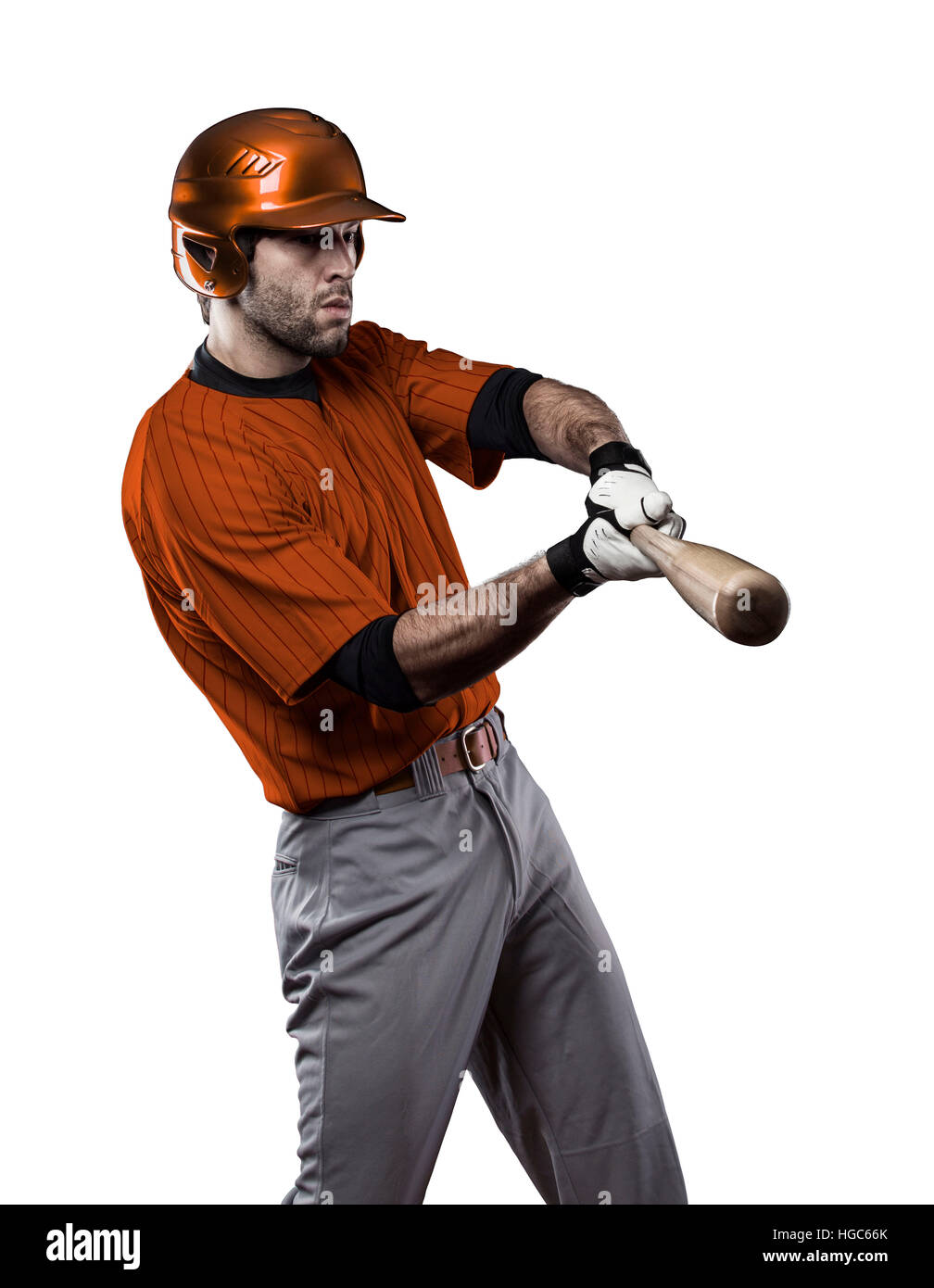 Baseball Player with a orange uniform on a white background Stock Photo ...