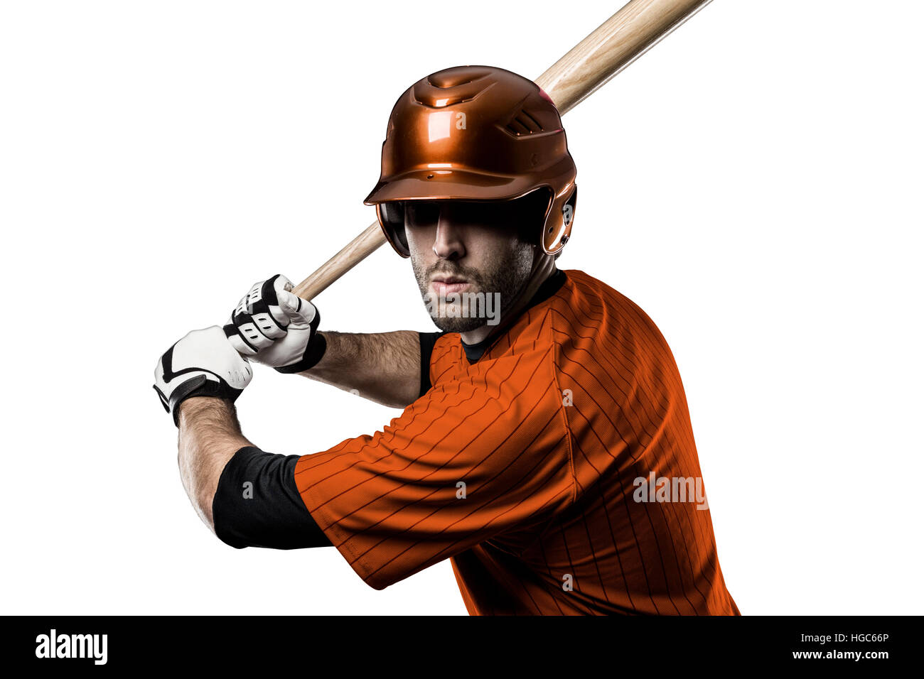 Baseball Player with a orange uniform on a white background Stock Photo ...