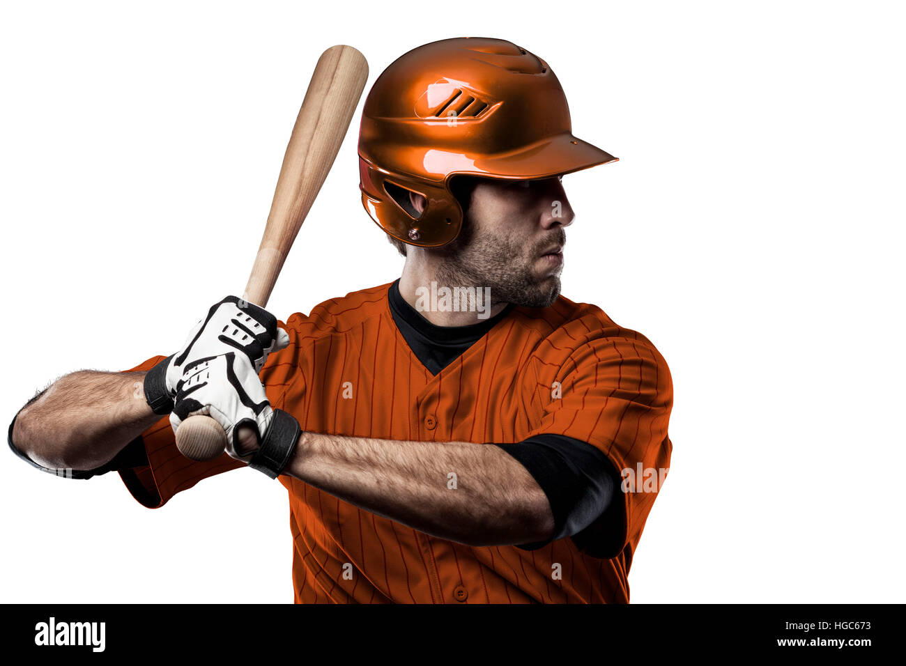 Baseball Player with a orange uniform on a white background Stock Photo ...