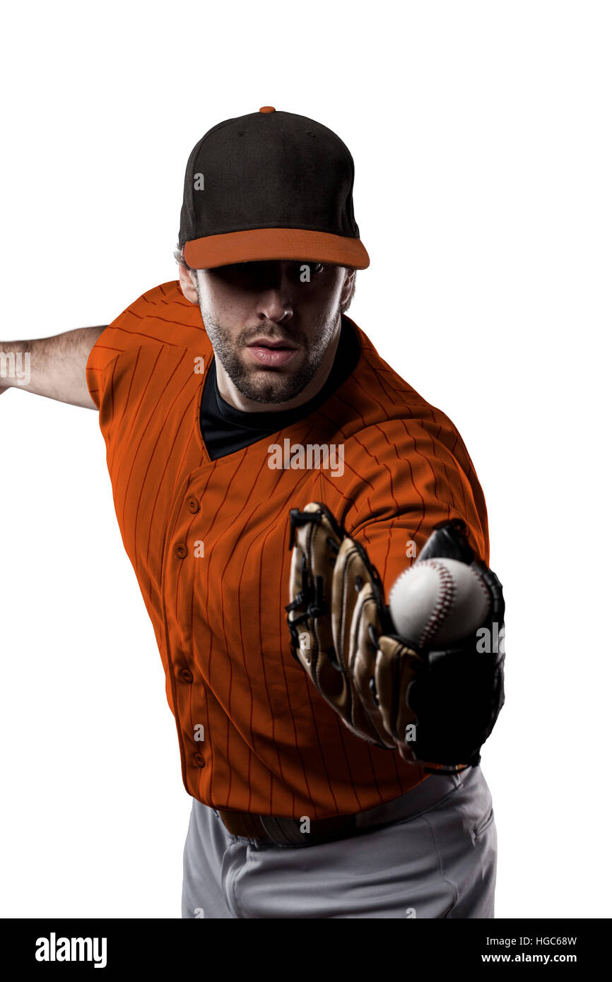 Baseball Player with a orange uniform on a white background Stock Photo ...