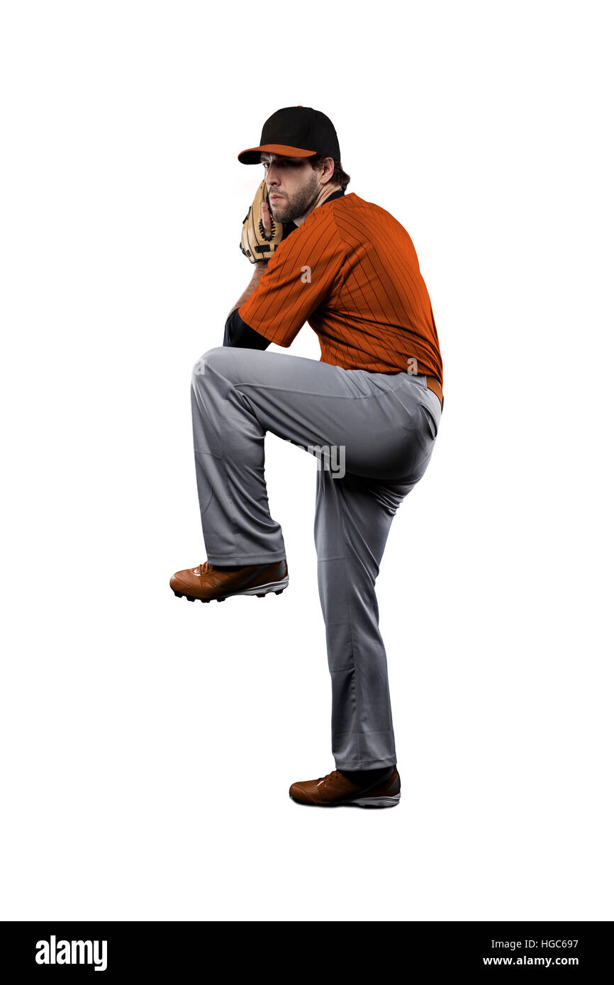 Pitcher Baseball Player with a orange uniform on a white background ...