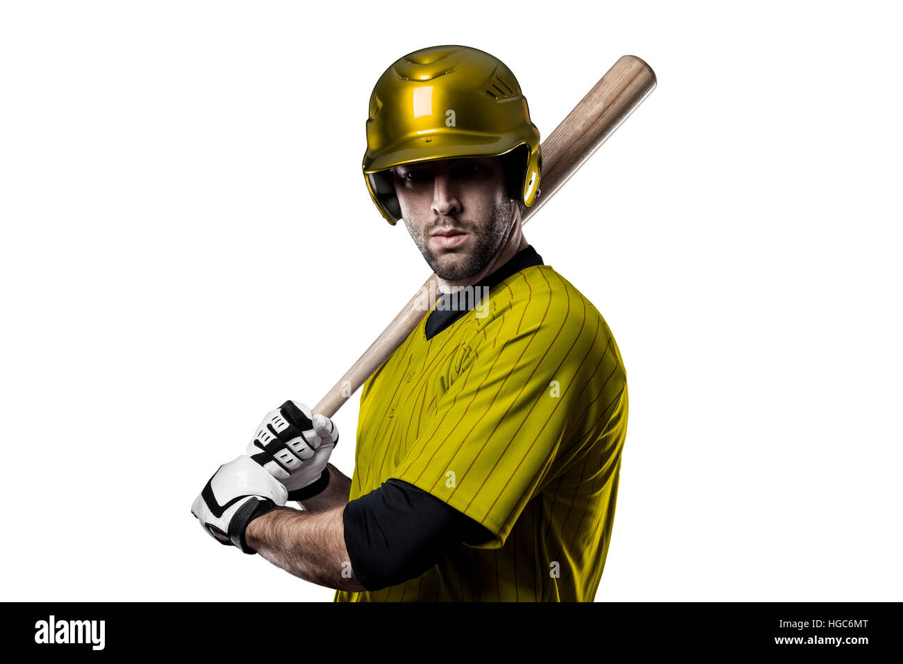 Baseball Player with a yellow uniform on a white background Stock Photo ...