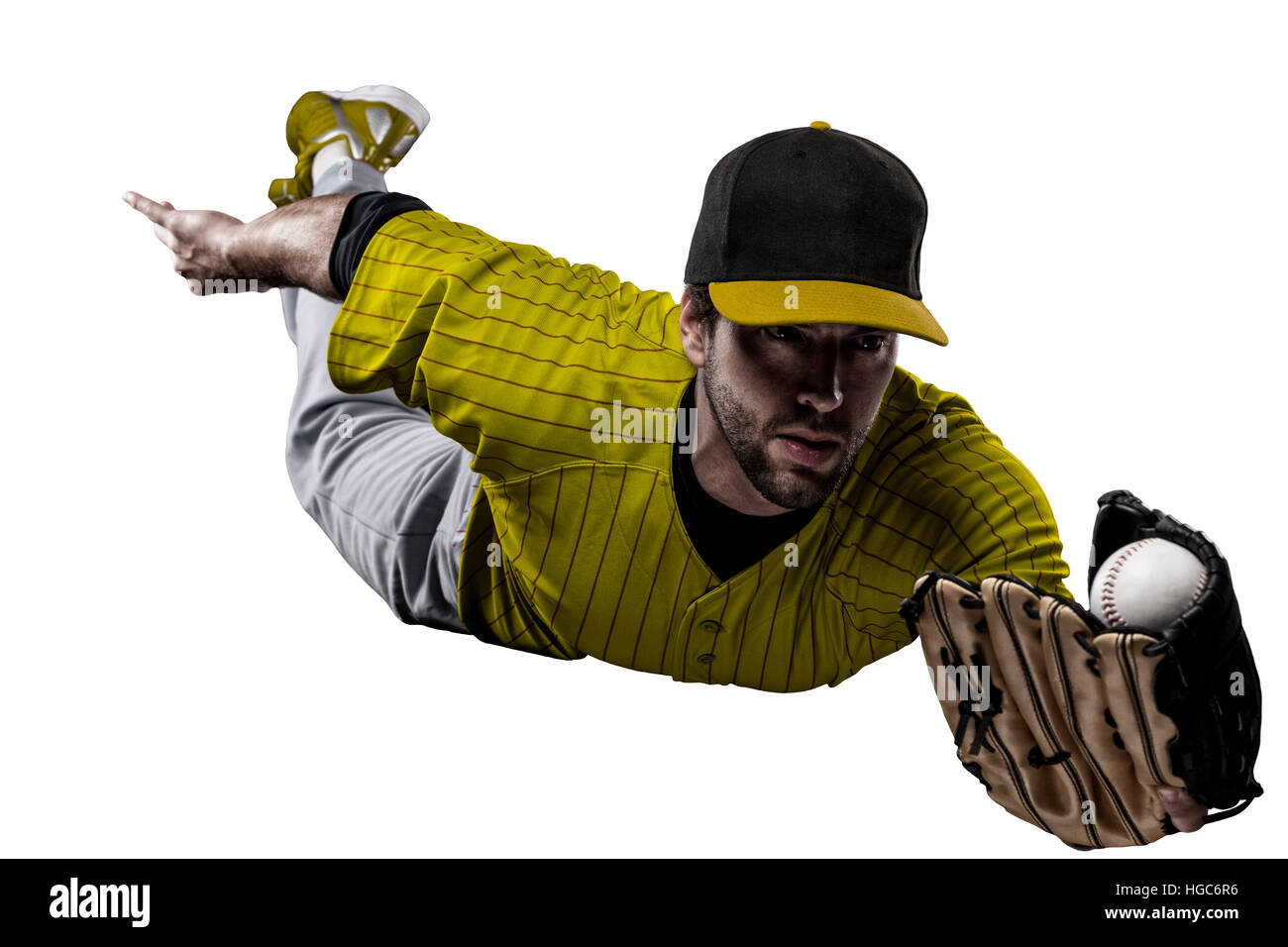 Baseball Player with a yellow uniform on a white background Stock Photo ...