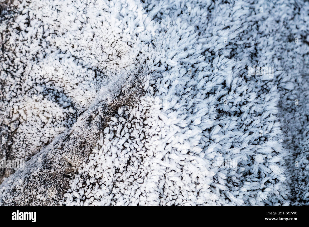 Frozen rocks with frost over them Stock Photo - Alamy