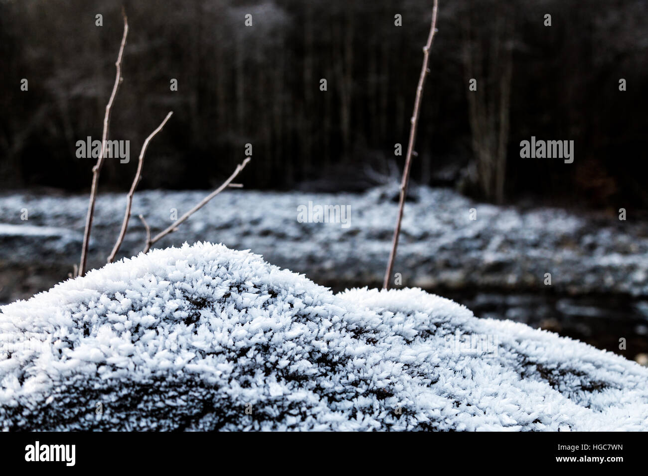 Frozen rocks with frost over them Stock Photo - Alamy