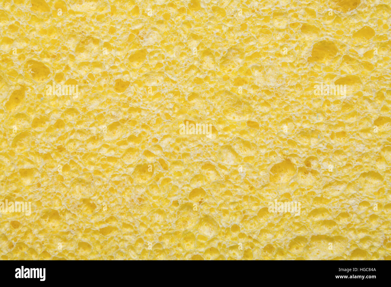 yellow sponge texture background Stock Photo - Alamy