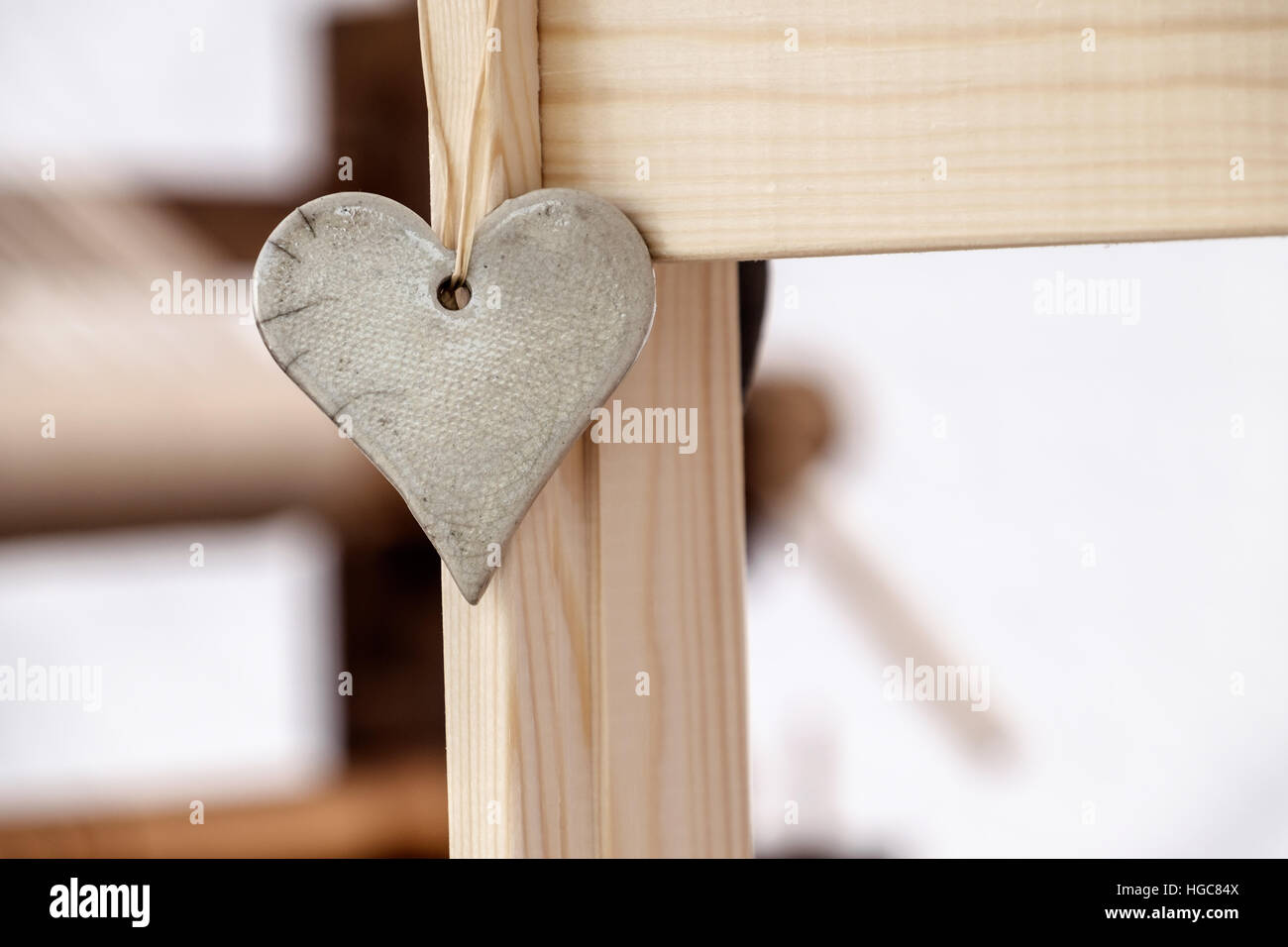 Stone heart shape on Wood. Love symbol Stock Photo - Alamy