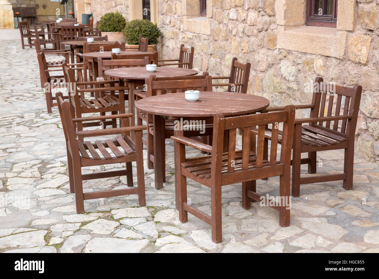Wooden cafe tables hi-res stock photography and images - Alamy