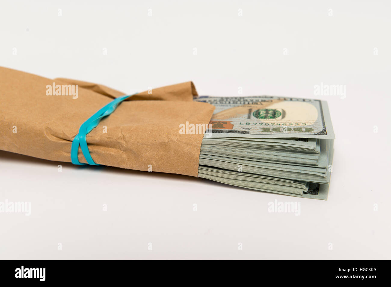 Stack of hundred dollar bills banknotes and envelope Stock Photo - Alamy