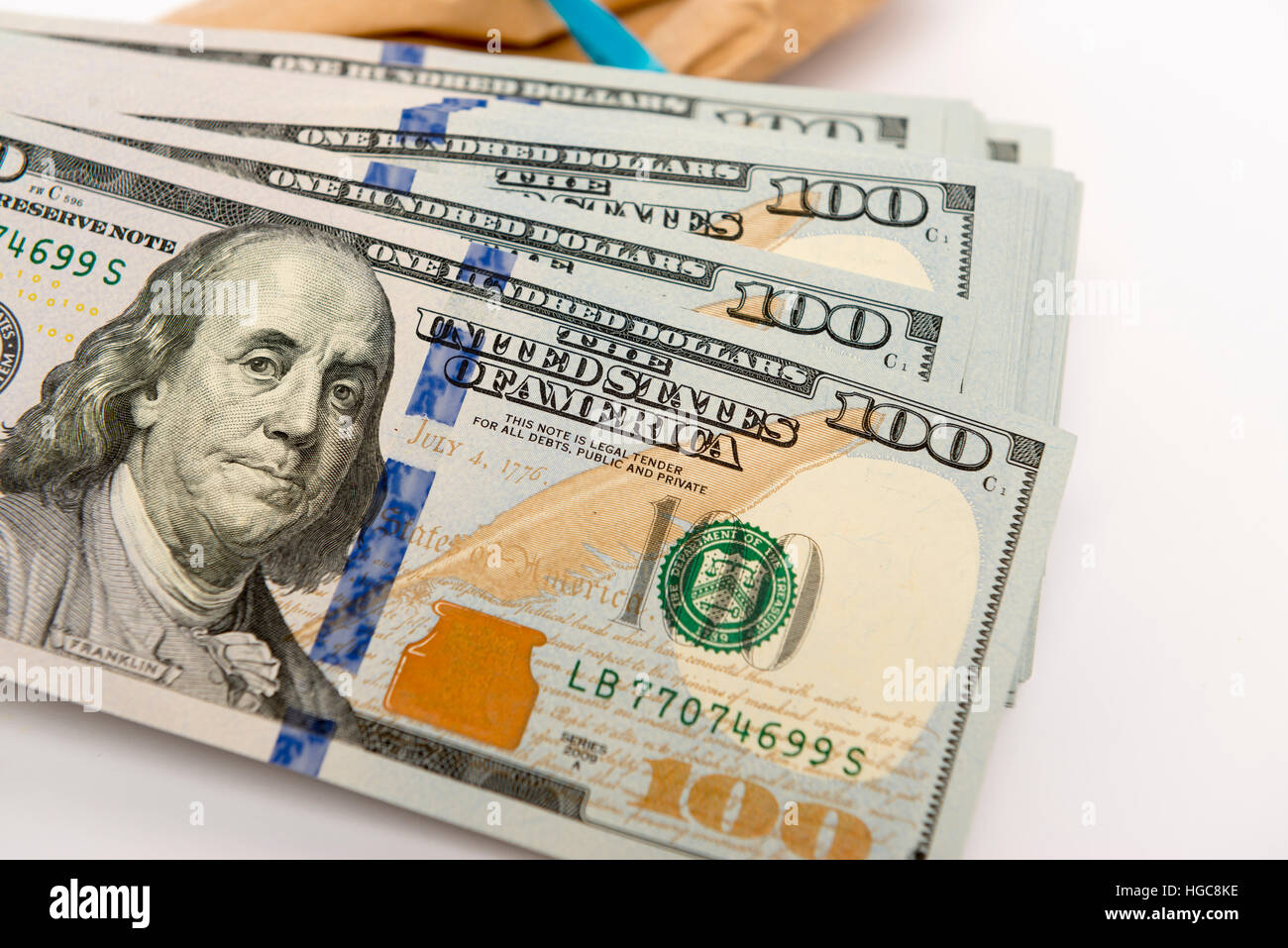Stack of hundred dollar bills banknotes and envelope Stock Photo - Alamy