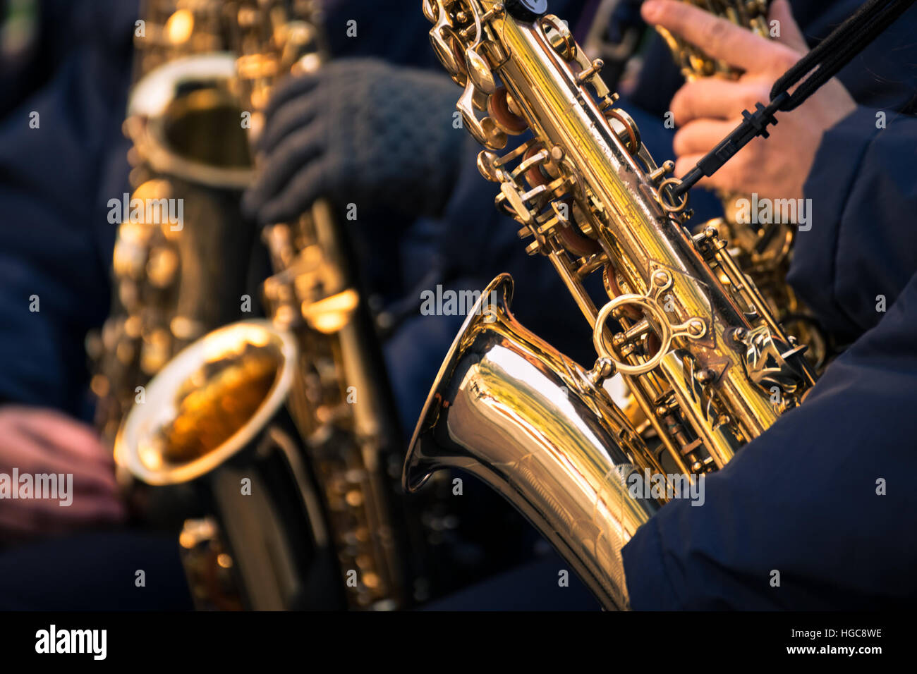 Saxophones of a town band during a performance Stock Photo - Alamy