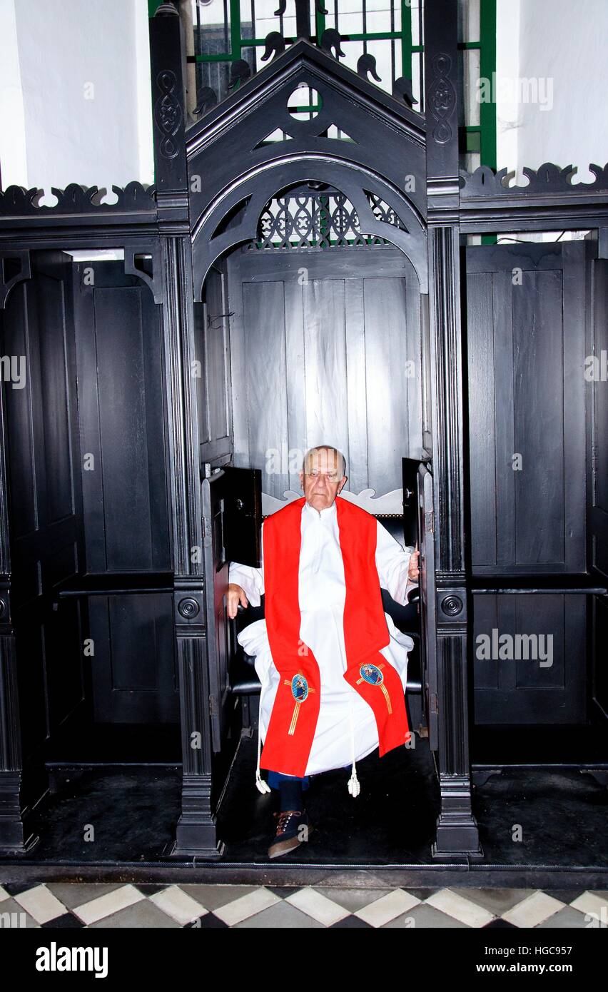 Catholic priest confession hi-res stock photography and images - Alamy