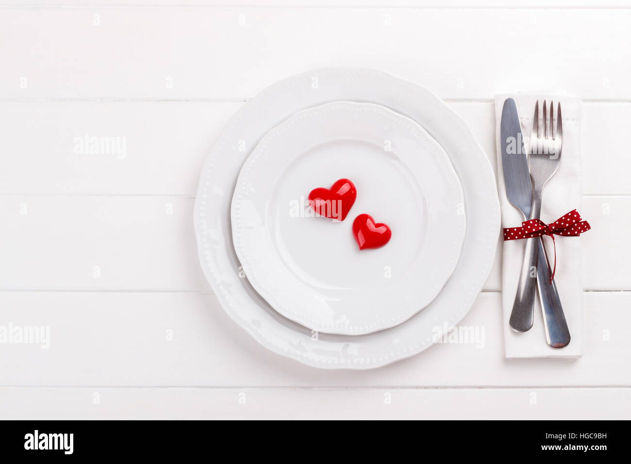 Romantic table setting on white wooden table.Valentine's day card ...